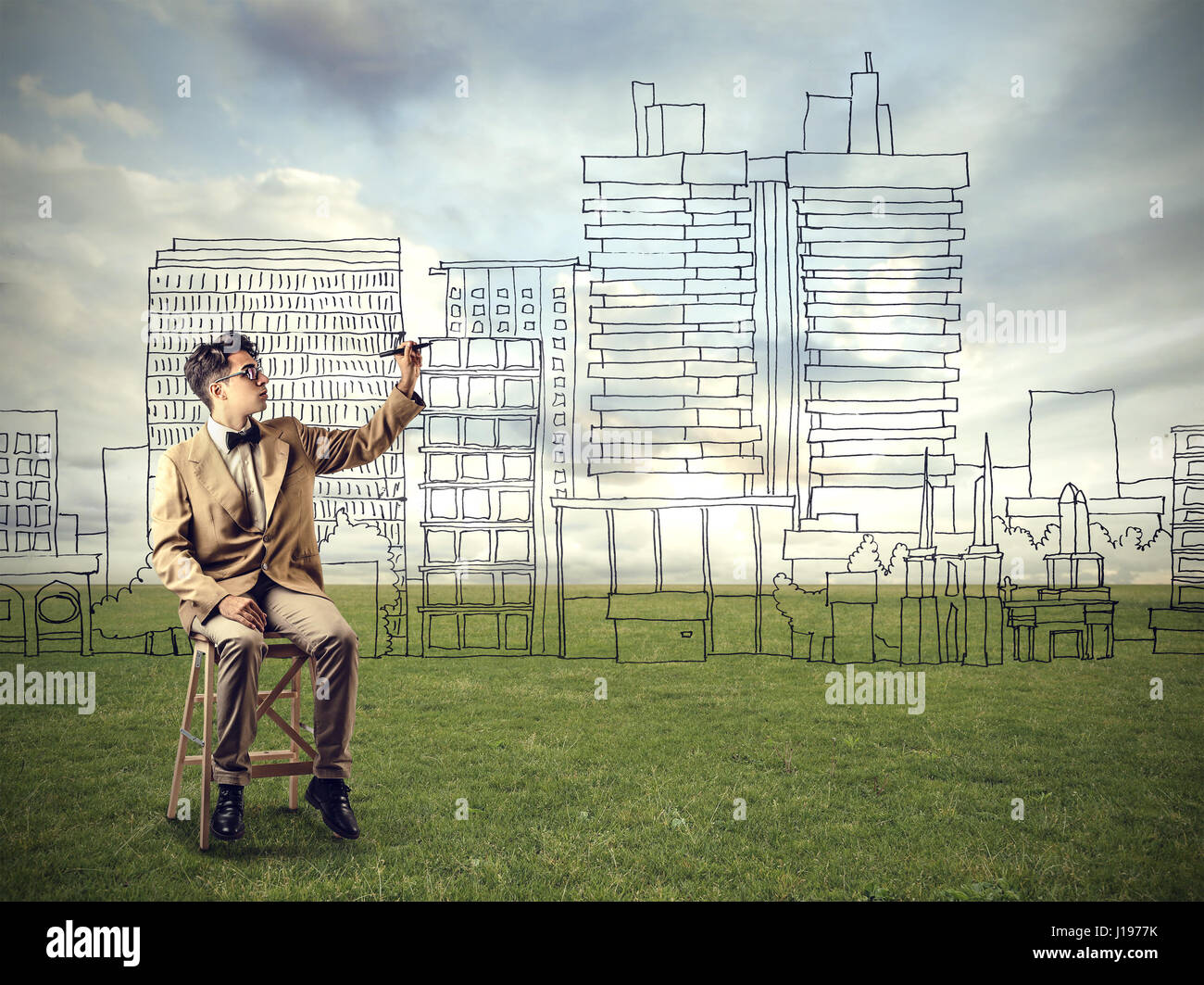 Man thinking how design of building hi-res stock photography and images ...