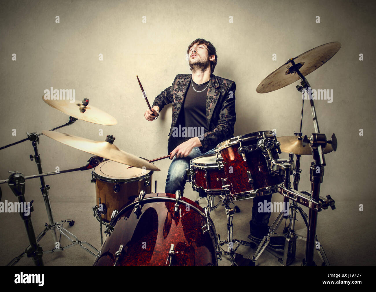 Man playing on drums Stock Photo - Alamy