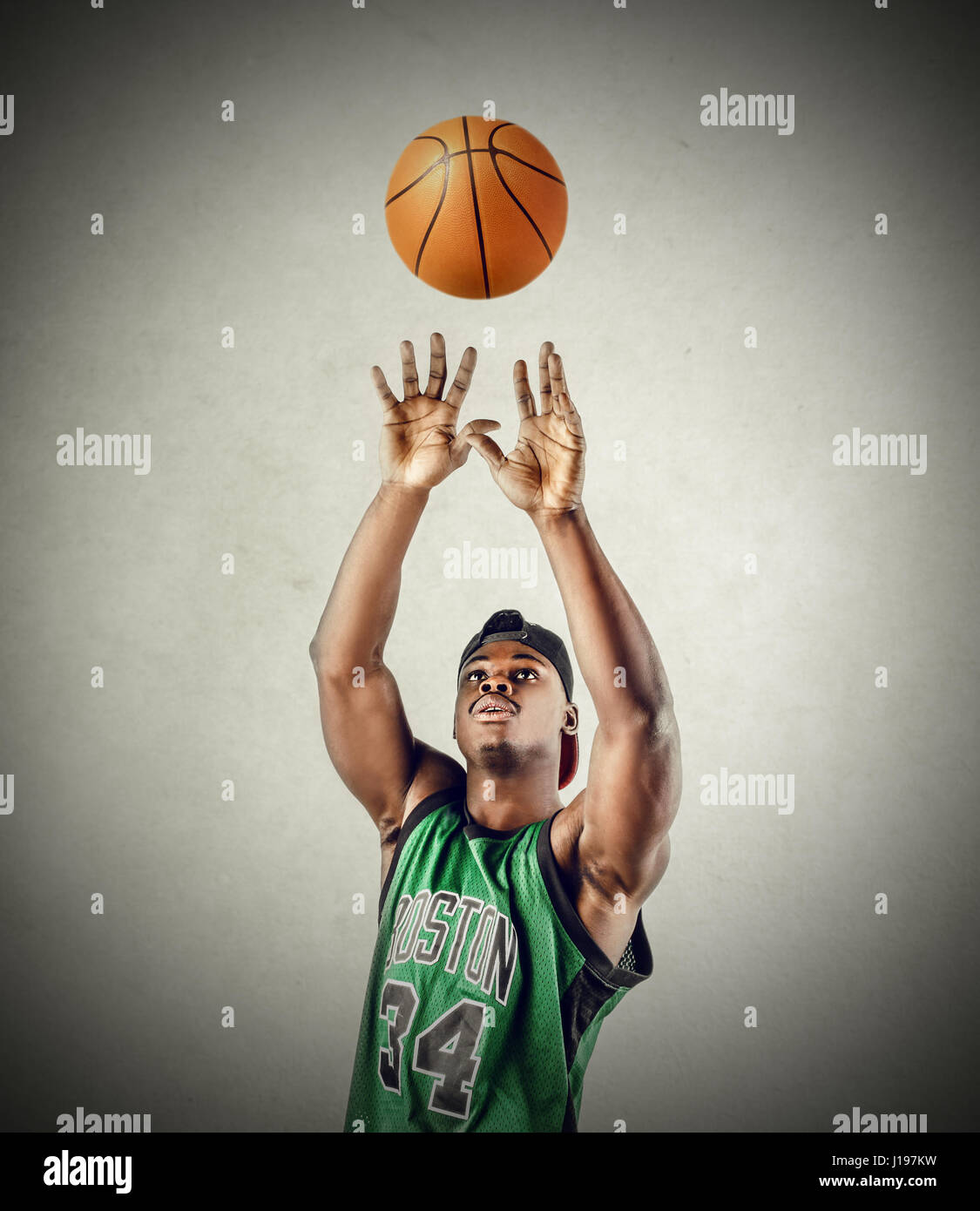 Man throwing basketball Stock Photo - Alamy