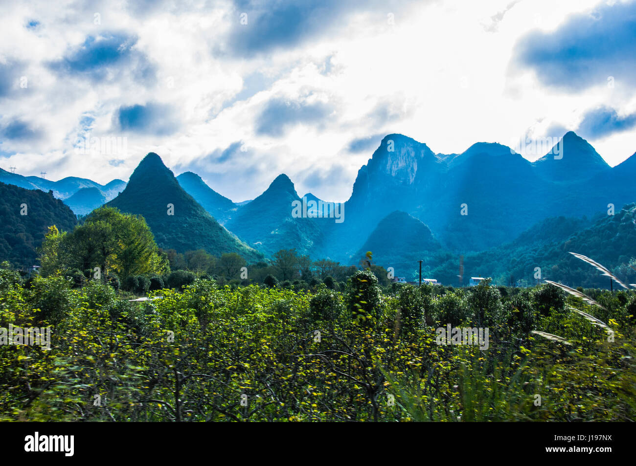 Beautiful mountains and rural scenery in summer Stock Photo - Alamy