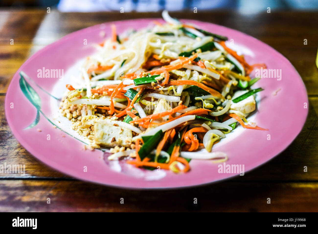 Pad thai on pink on a plate in restaurant, Thailand Stock Photo - Alamy