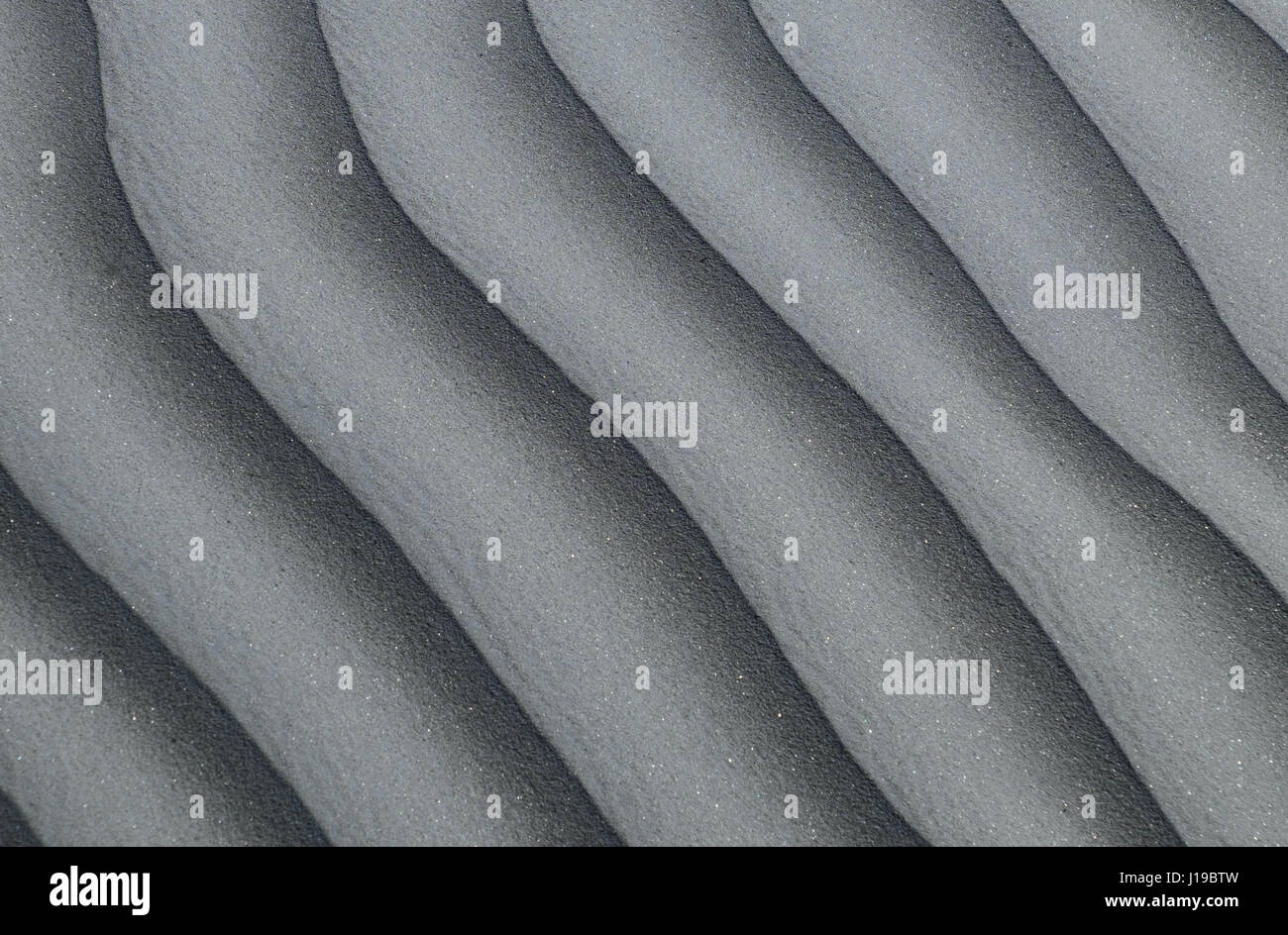 Sand dune gray color close-up Stock Photo - Alamy