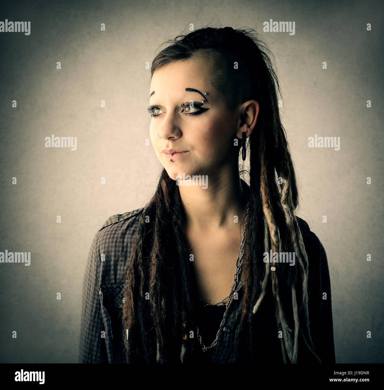 Alternative woman with dreads Stock Photo - Alamy