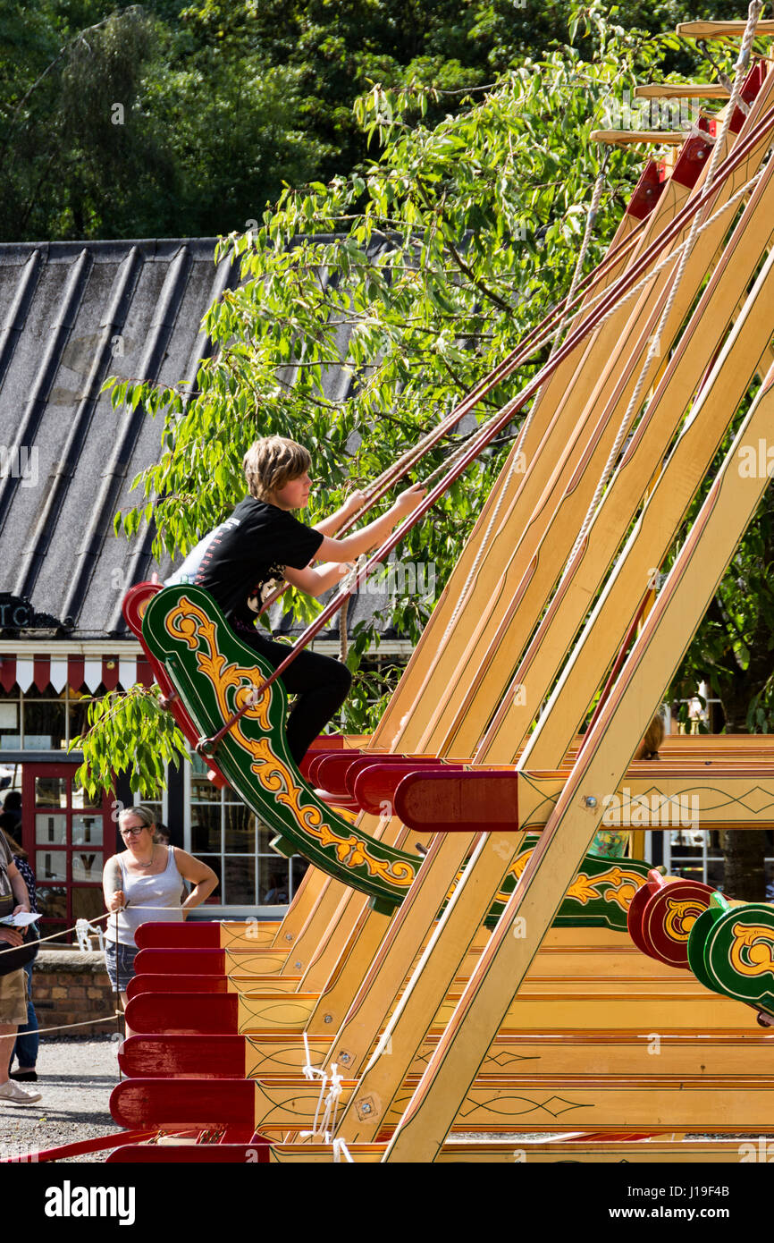 Vintage children's fairground swings at the Blists Hill Victorian Town ...