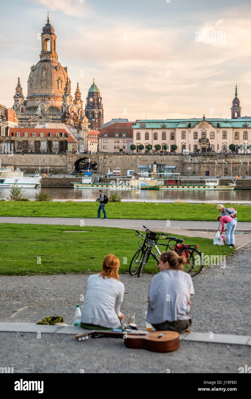 People enjoy sunset in front the Dresden skyline, Saxony, Germany Stock ...