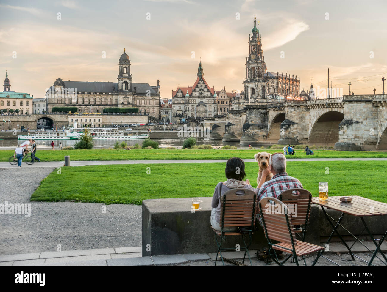 People enjoy sunset in front the Dresden skyline, Saxony, Germany Stock ...