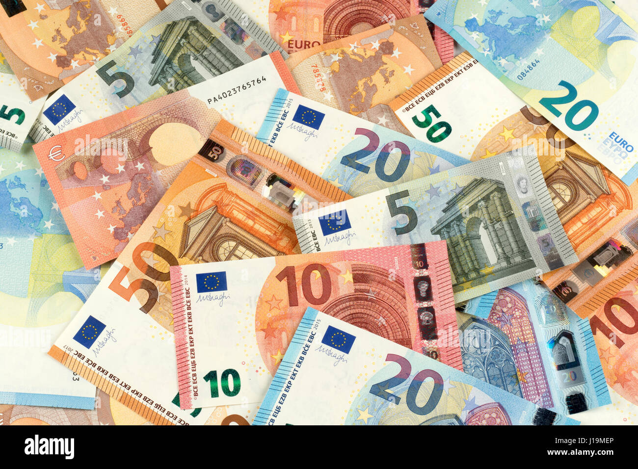 many euro bank note currency finance background Stock Photo - Alamy