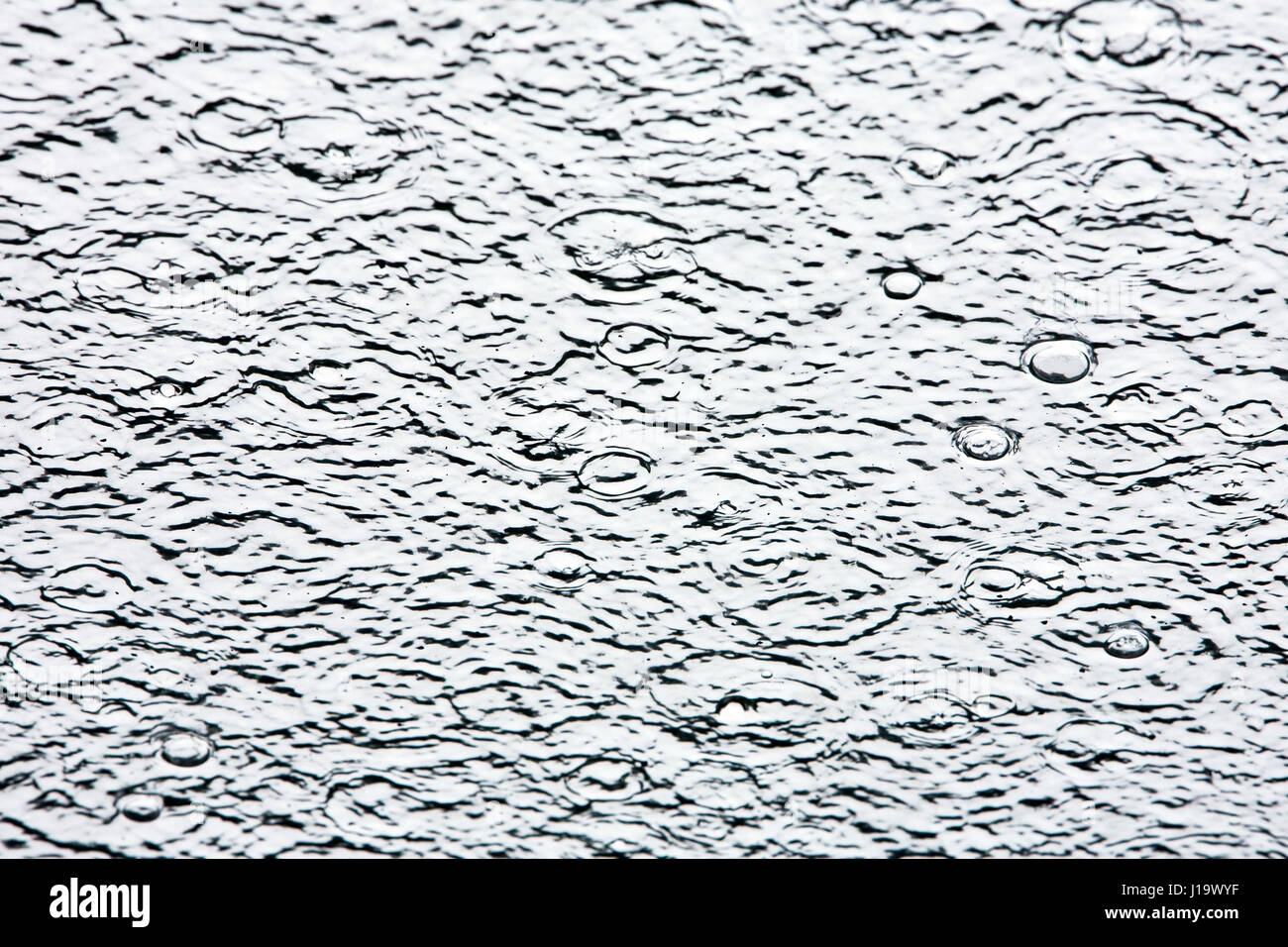 Abstract photo of water falling on glass creating patterns Stock Photo ...