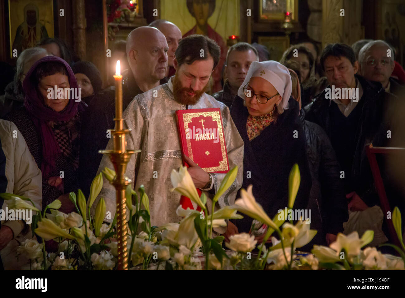 Orthodox believers pray during the Great Paschal Liturgy in the ...