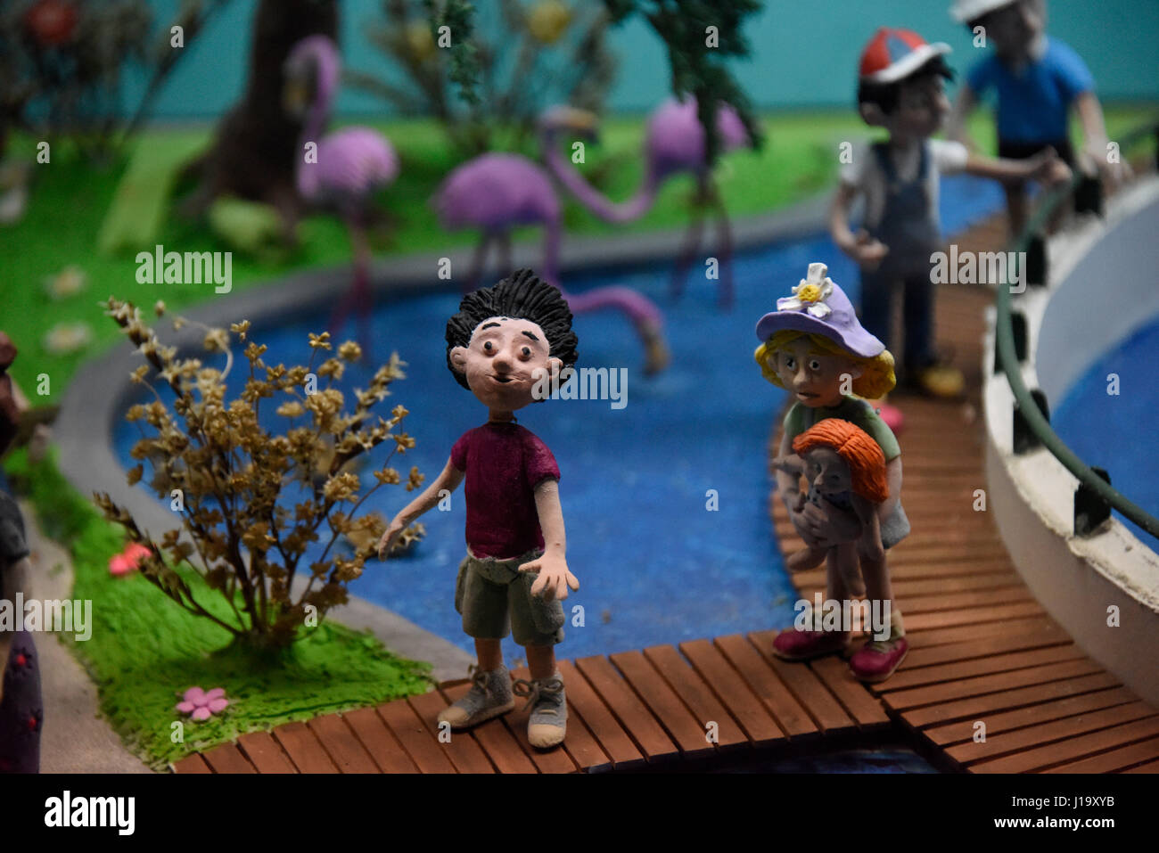 Small hand painted models of people Stock Photo - Alamy