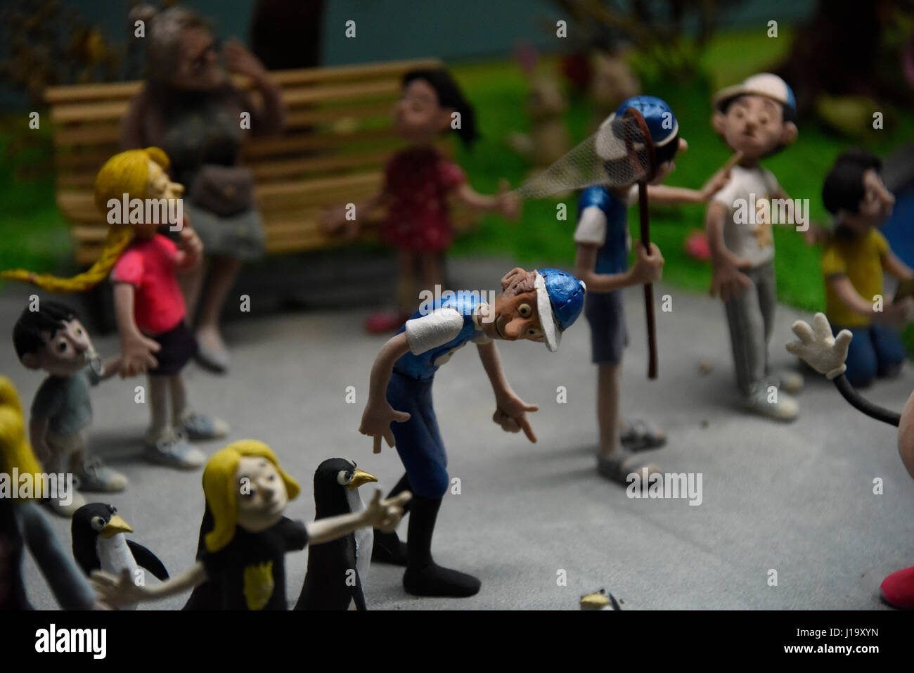 Small hand painted models of people Stock Photo - Alamy