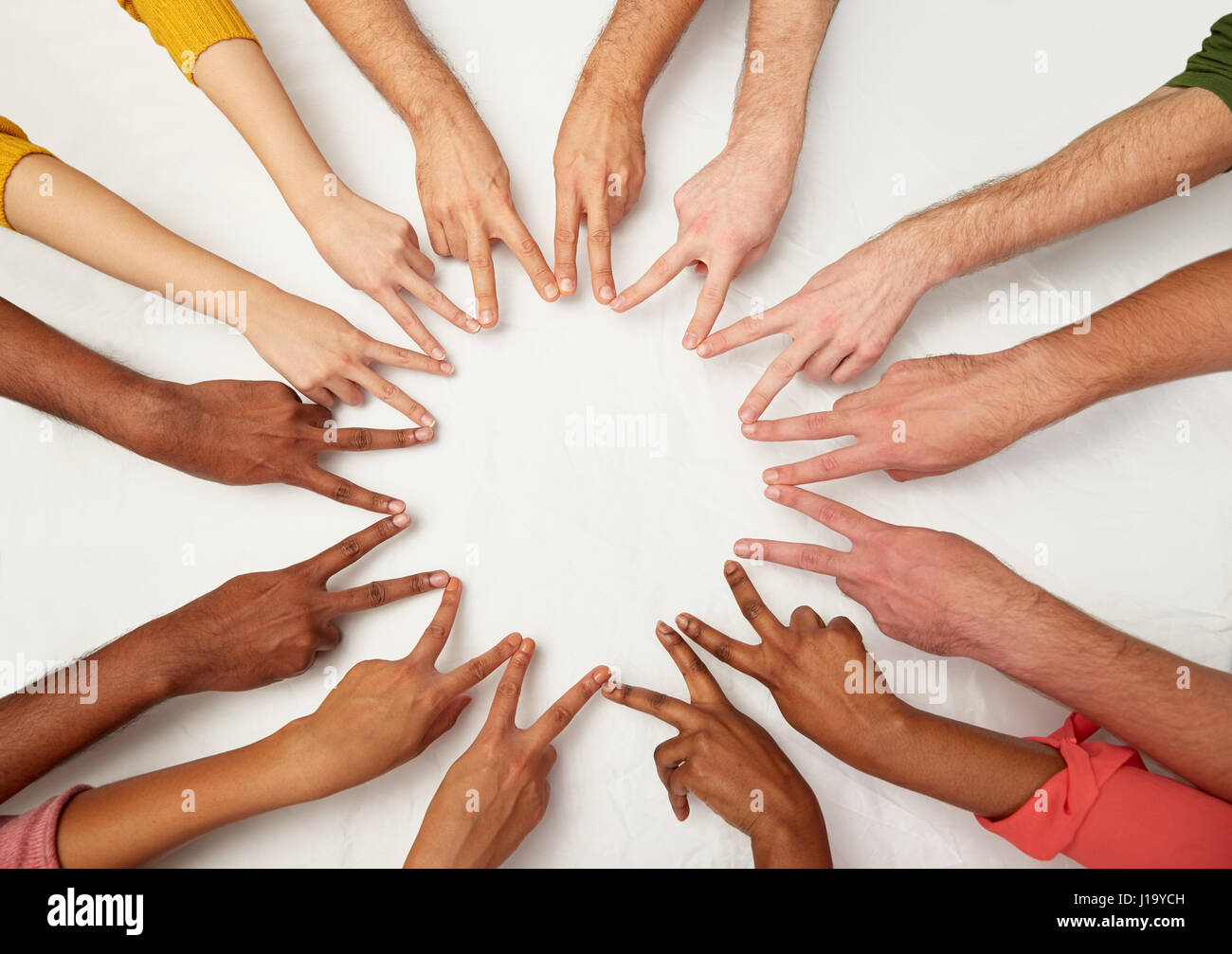 group of international people showing peace sign Stock Photo - Alamy