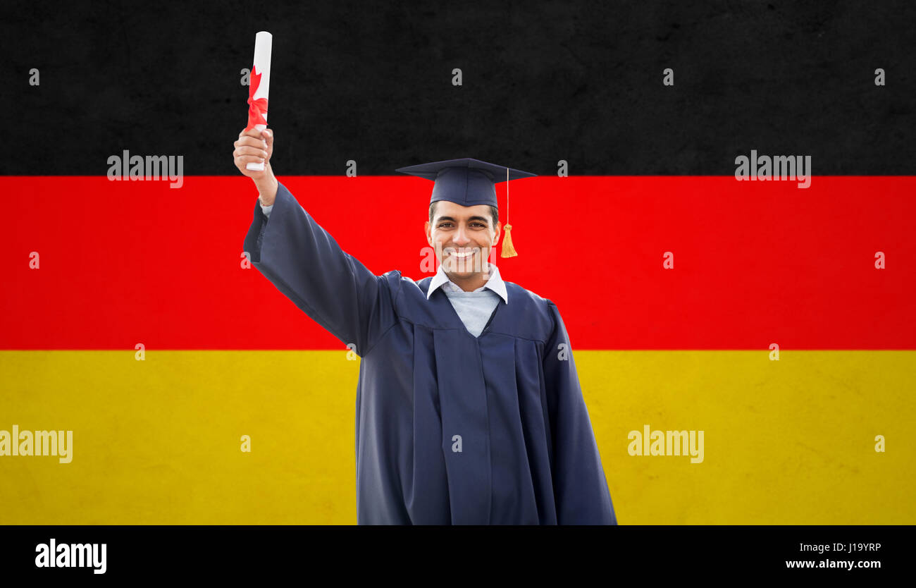 happy male student with diploma over german flag Stock Photo - Alamy
