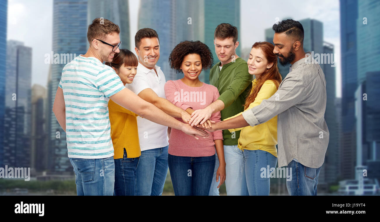 international group of happy people holding hands Stock Photo - Alamy