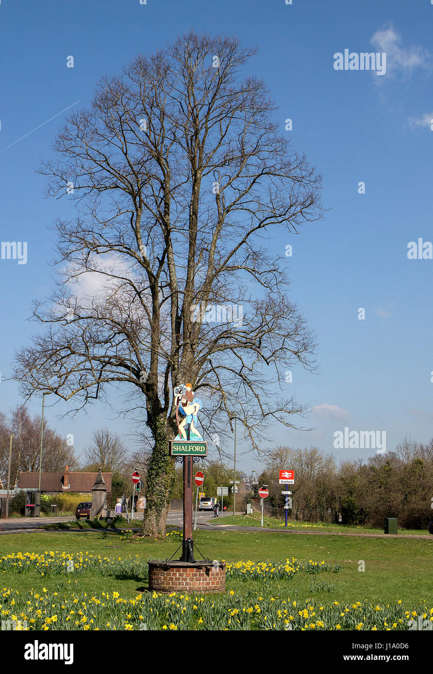 Village sign ,Shalford, Surrey, showing St.Christopher carrying the ...