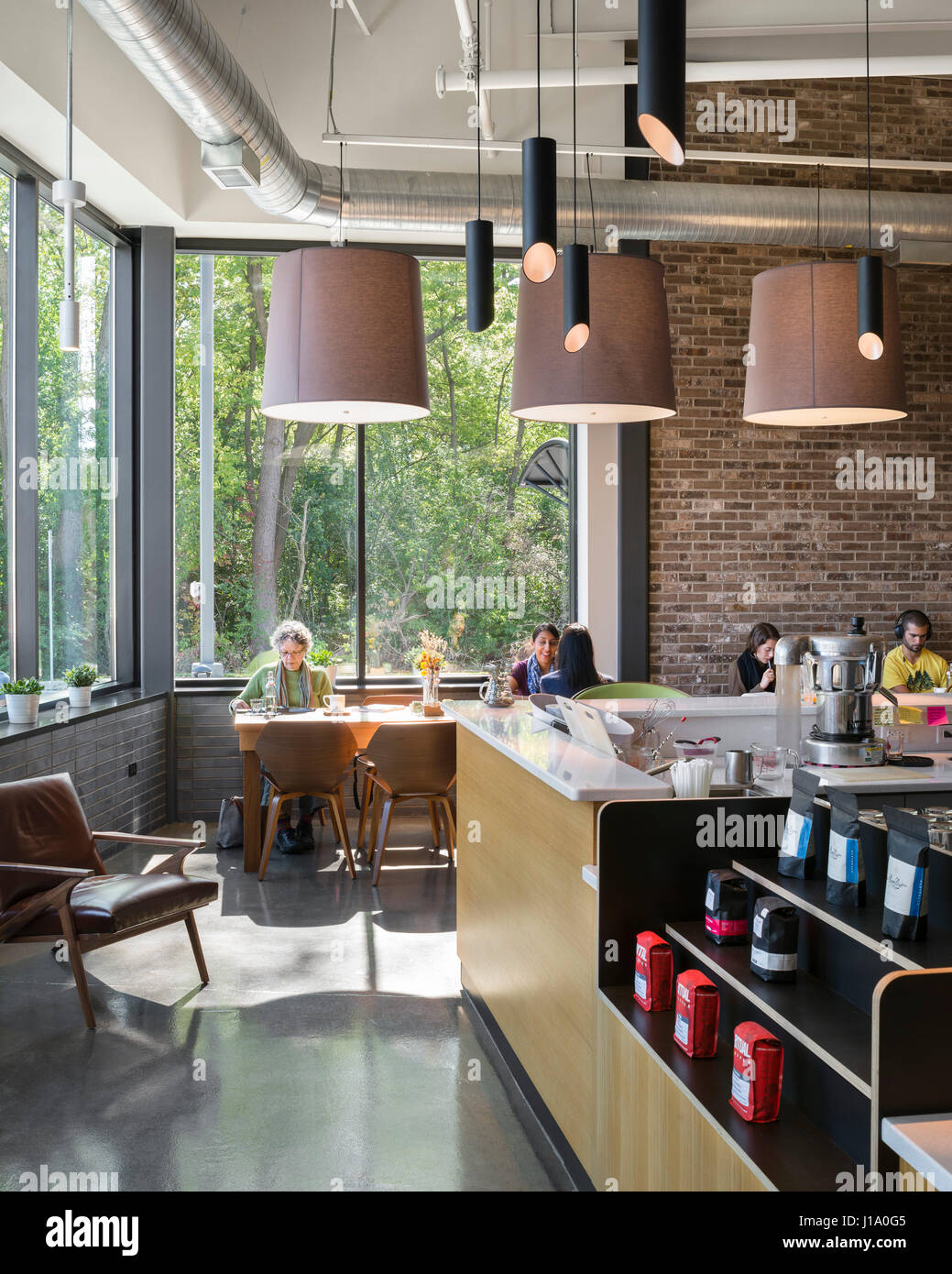 Interior view of the Glassbox cafe with a view of the adjacent wetlands ...