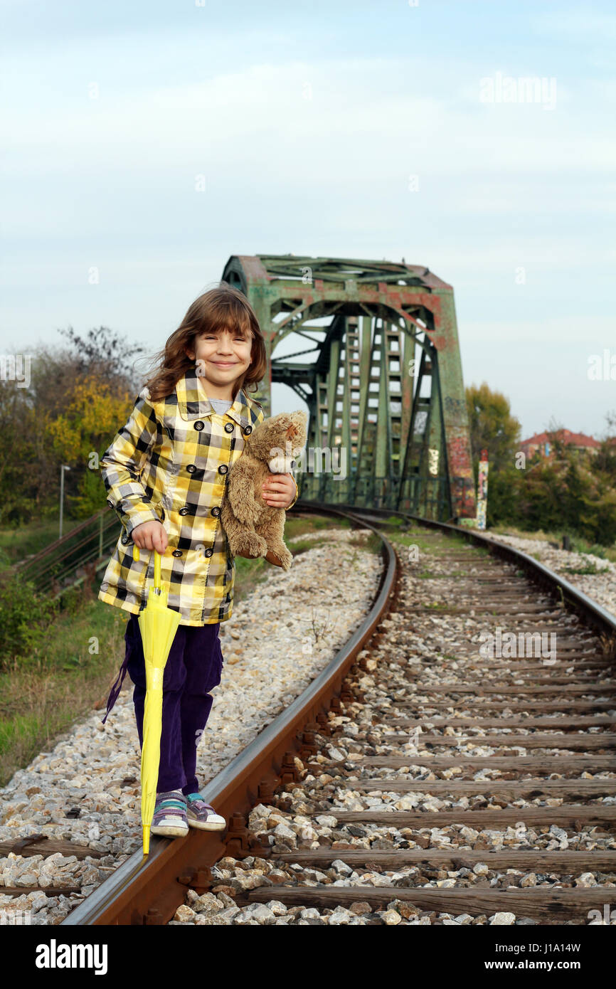 Beautiful girl on train tracks hi-res stock photography and images - Alamy