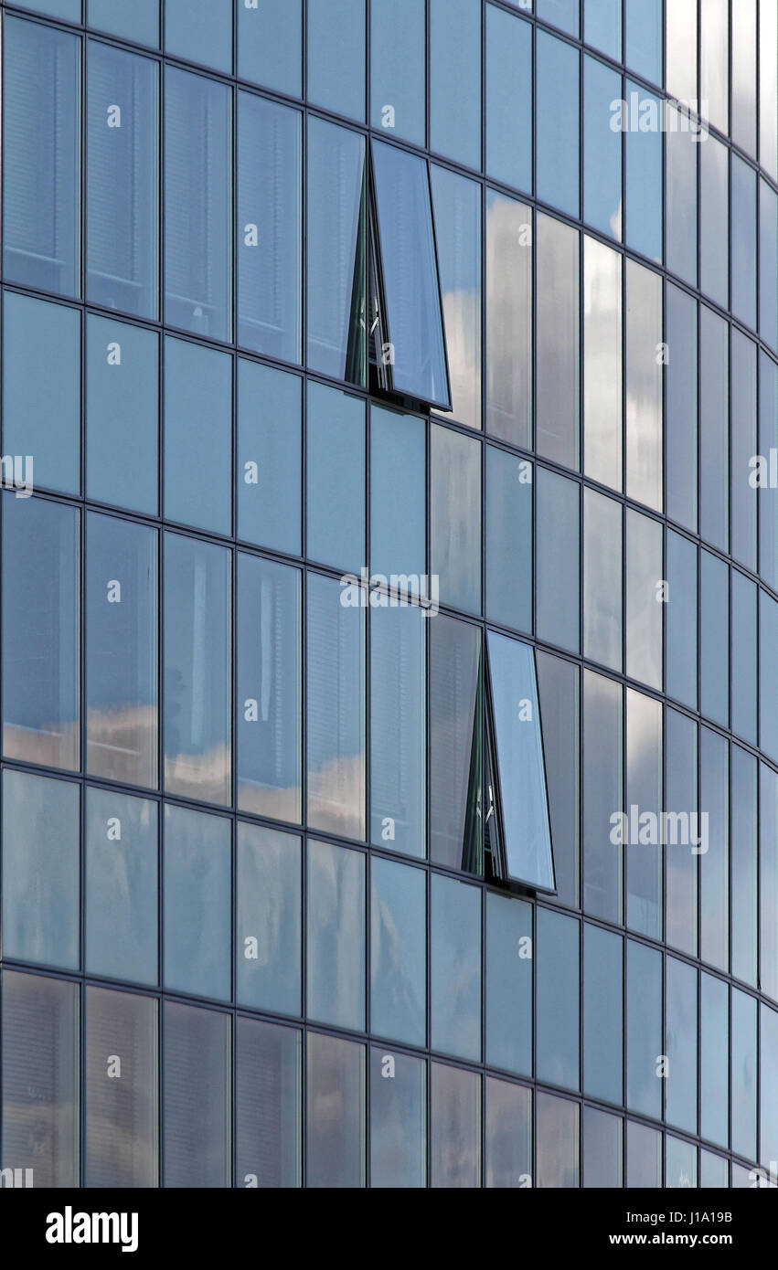 Skyscraper office building with two open windows Stock Photo - Alamy