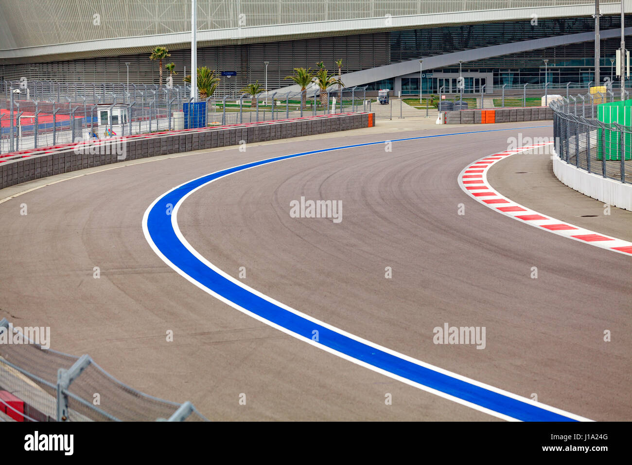 Motor racing track. Turning asphalt road with marking lines Stock Photo ...