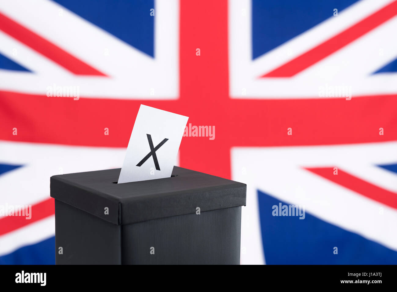Replica black ballot box set against UK flag / Union Jack as metaphor ...