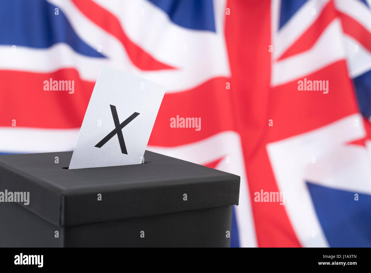 Replica black ballot box set against UK flag / Union Jack as metaphor ...