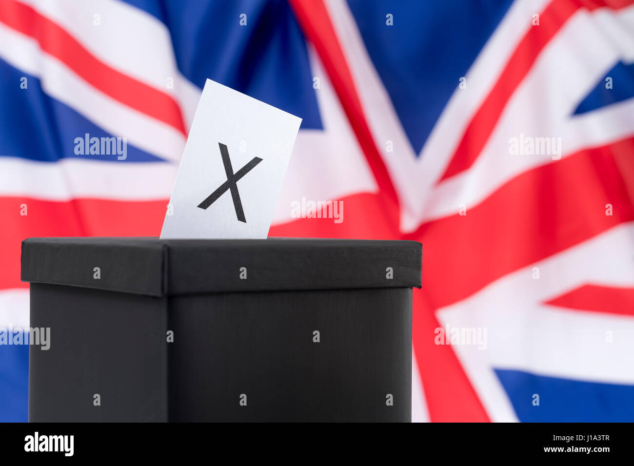 Replica black ballot box set against UK flag / Union Jack as metaphor ...