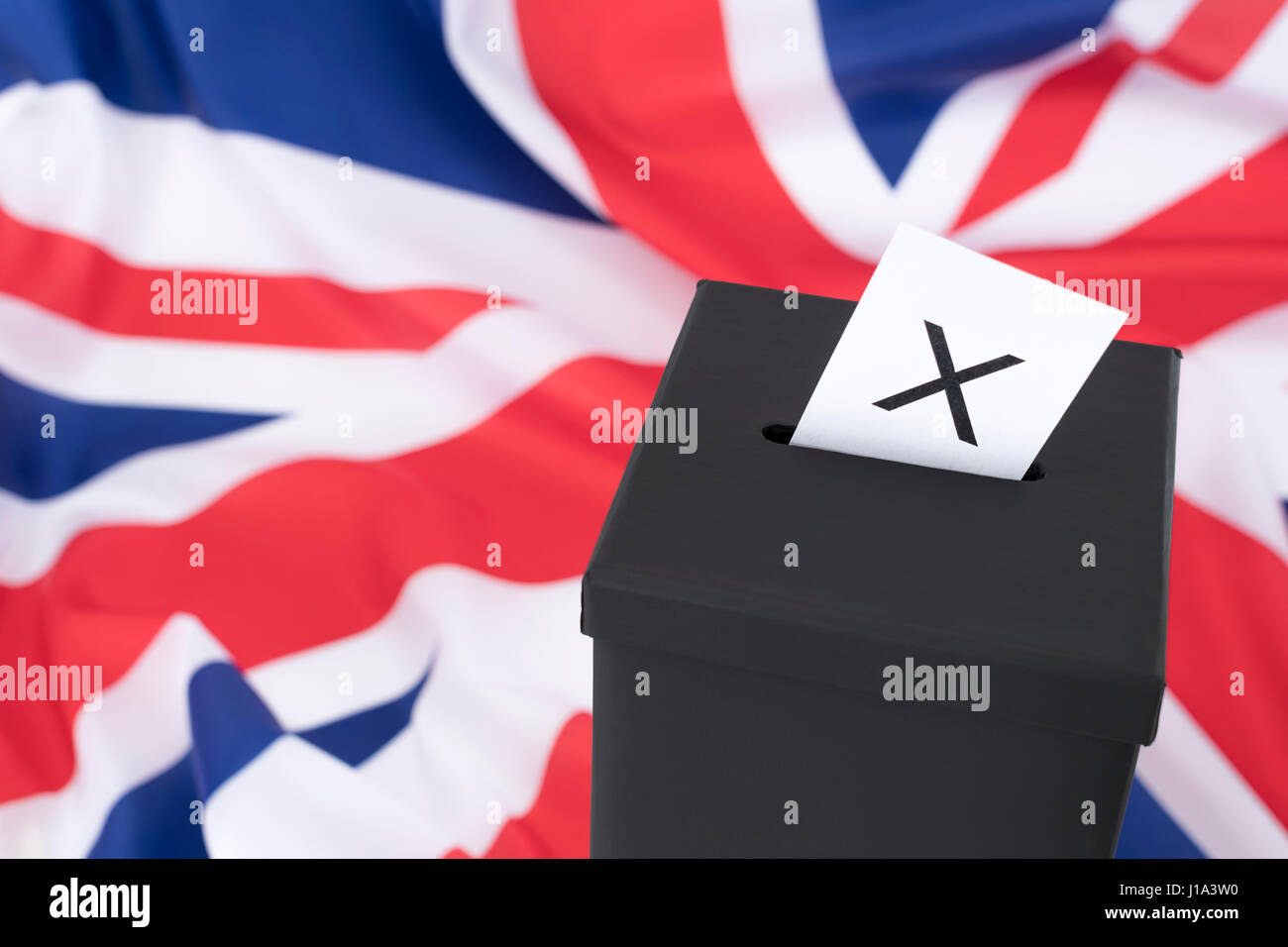 Replica black ballot box set against UK flag / Union Jack as metaphor ...