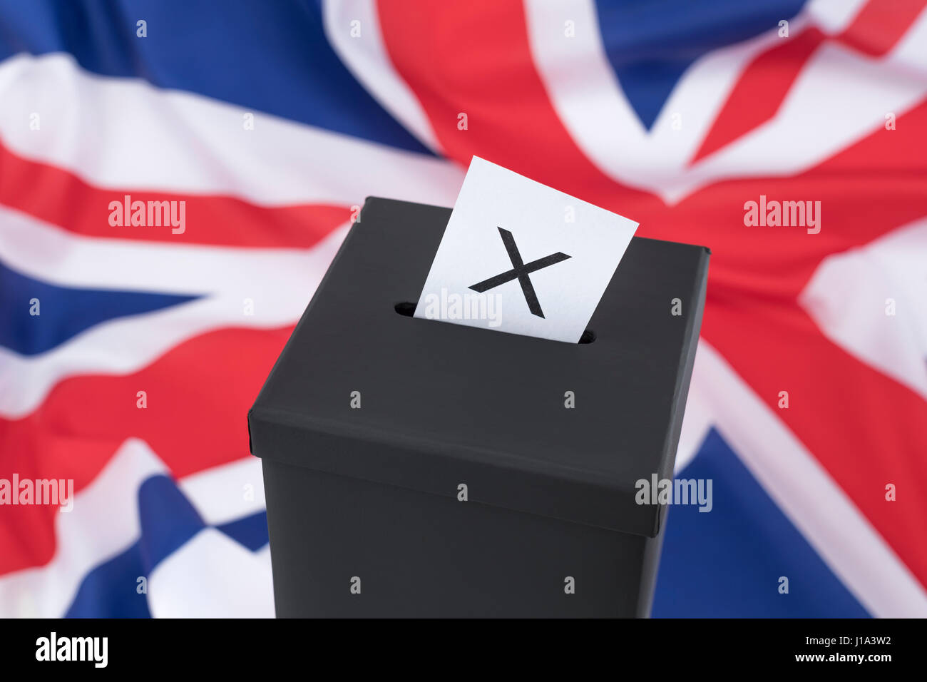 Replica black ballot box set against UK flag / Union Jack as metaphor ...