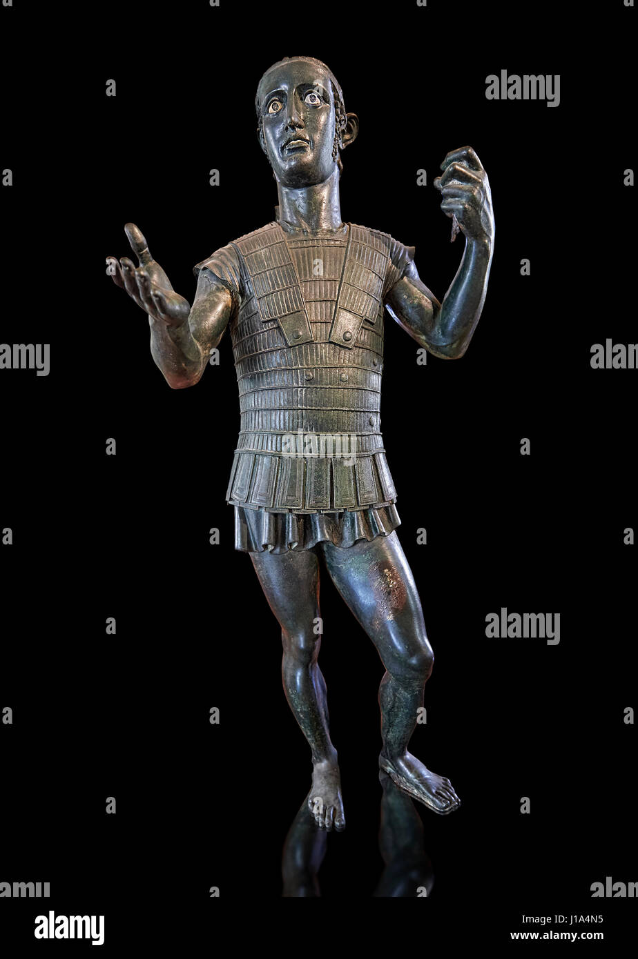 Etruscan bronze statue portraying a nearly life size young warrior ...