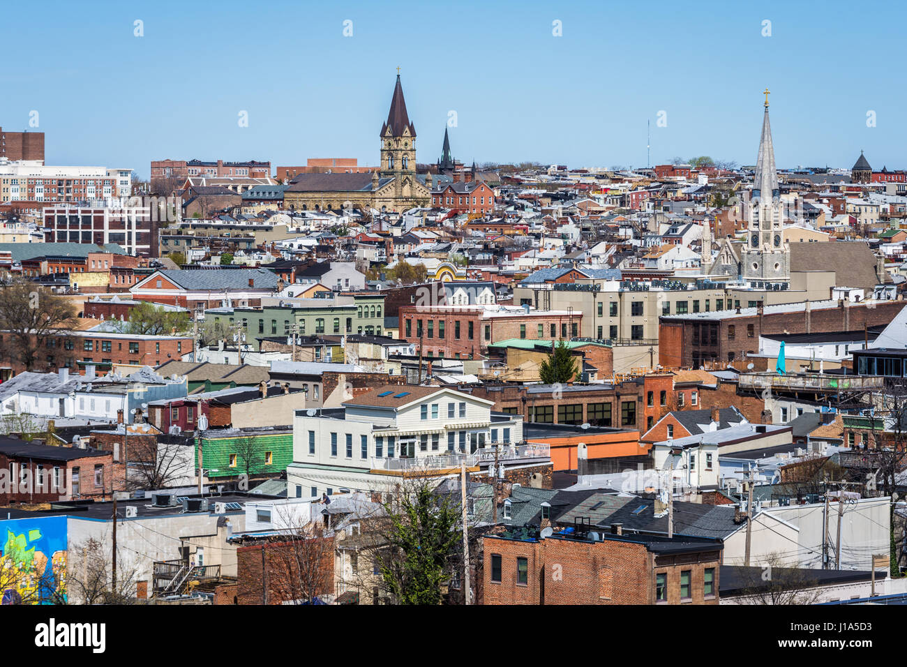 Aerial of downtown baltimore, maryland towards patterson park in spring ...