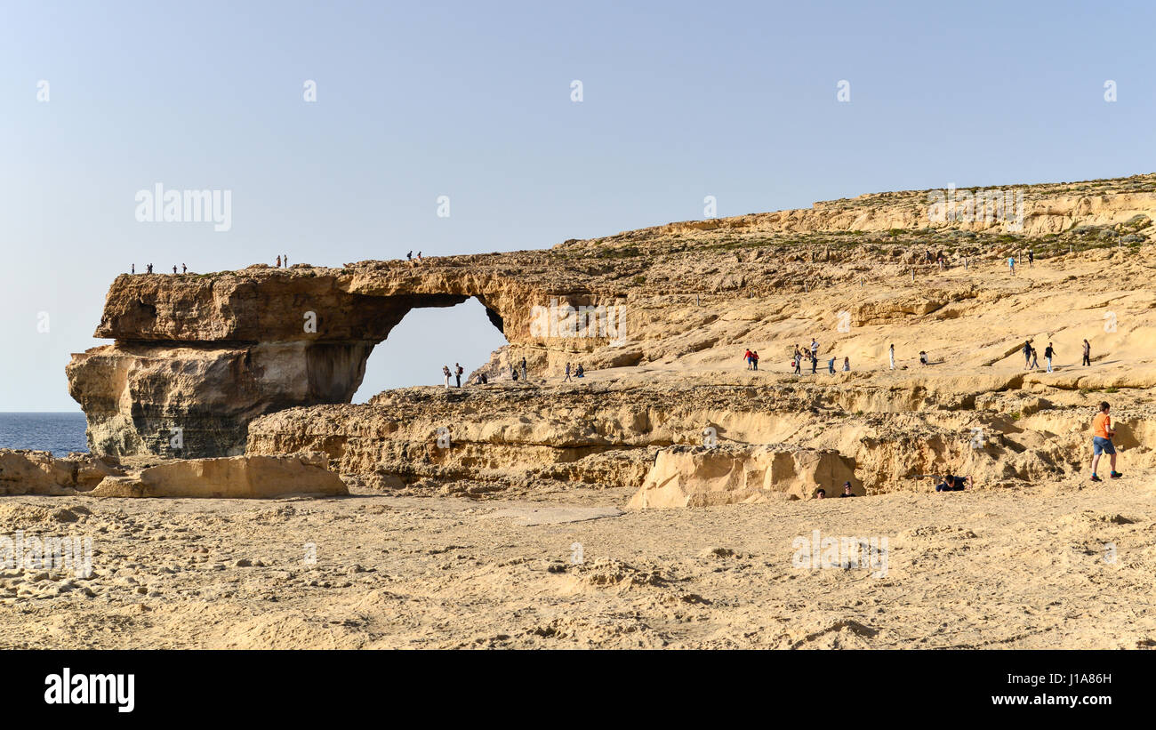 Azure Window Natural Rock Arch with tourists - Gozo, Malta Stock Photo ...