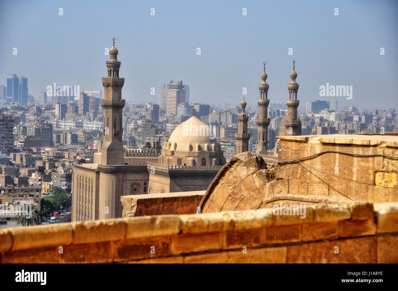 Mecca building in urban city in sunlight Stock Photo - Alamy