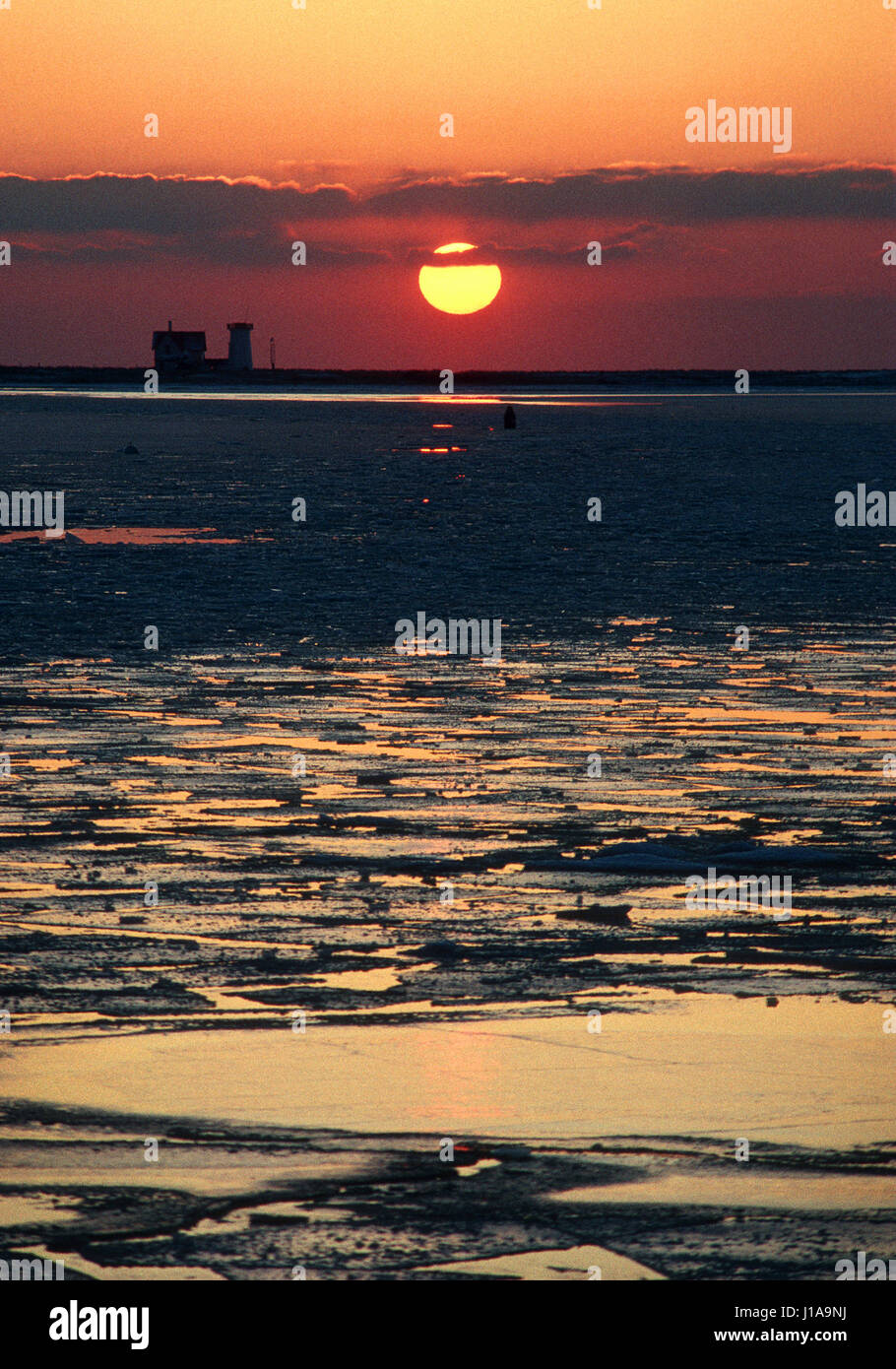 Stage Harbor Light (1880) in Winter. An ice covered Stage Harbor. Stage ...