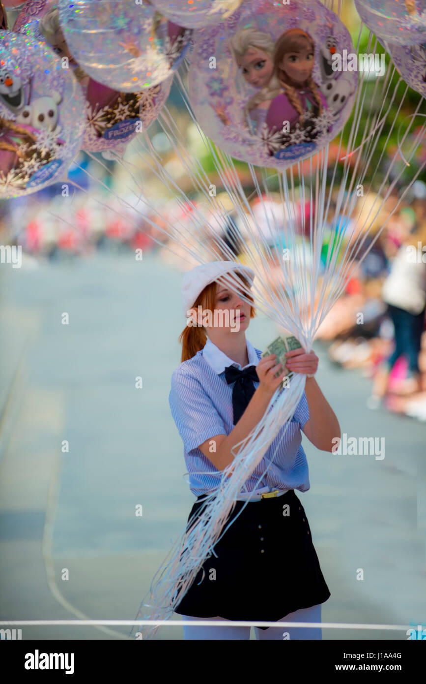 Walt Disney World character balloons on street Stock Photo - Alamy