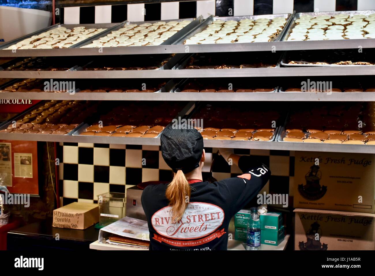 Charleston, South Carolina woman making candy at Savannah's Candy ...