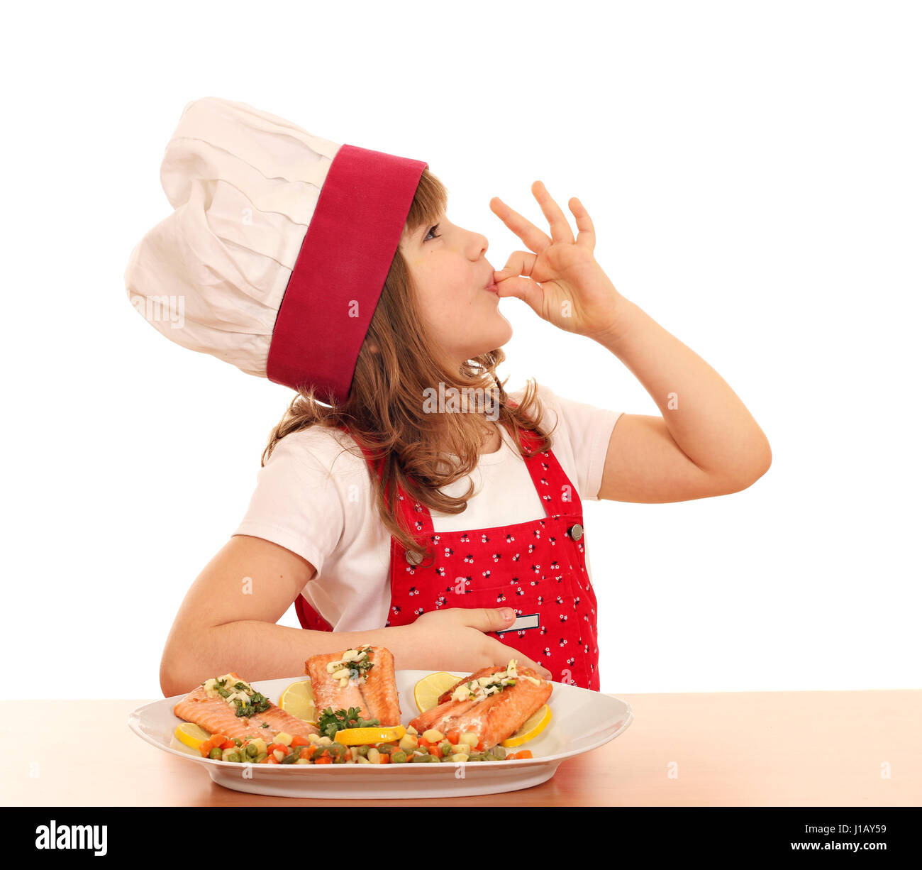 little girl cook with ok hand sign and salmon on dish Stock Photo - Alamy