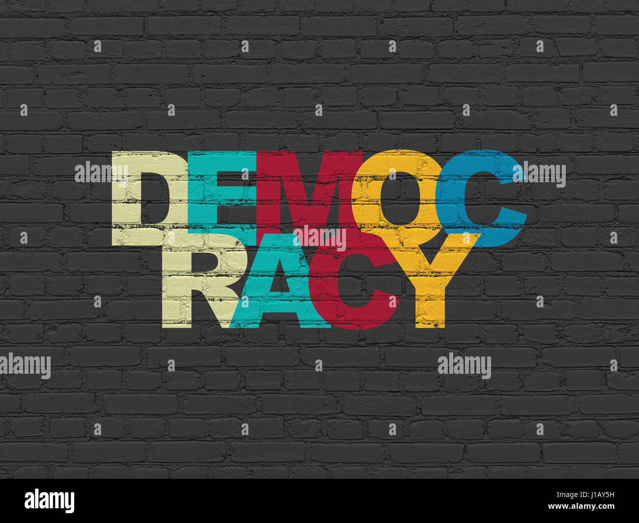 Political concept: Democracy on wall background Stock Photo - Alamy