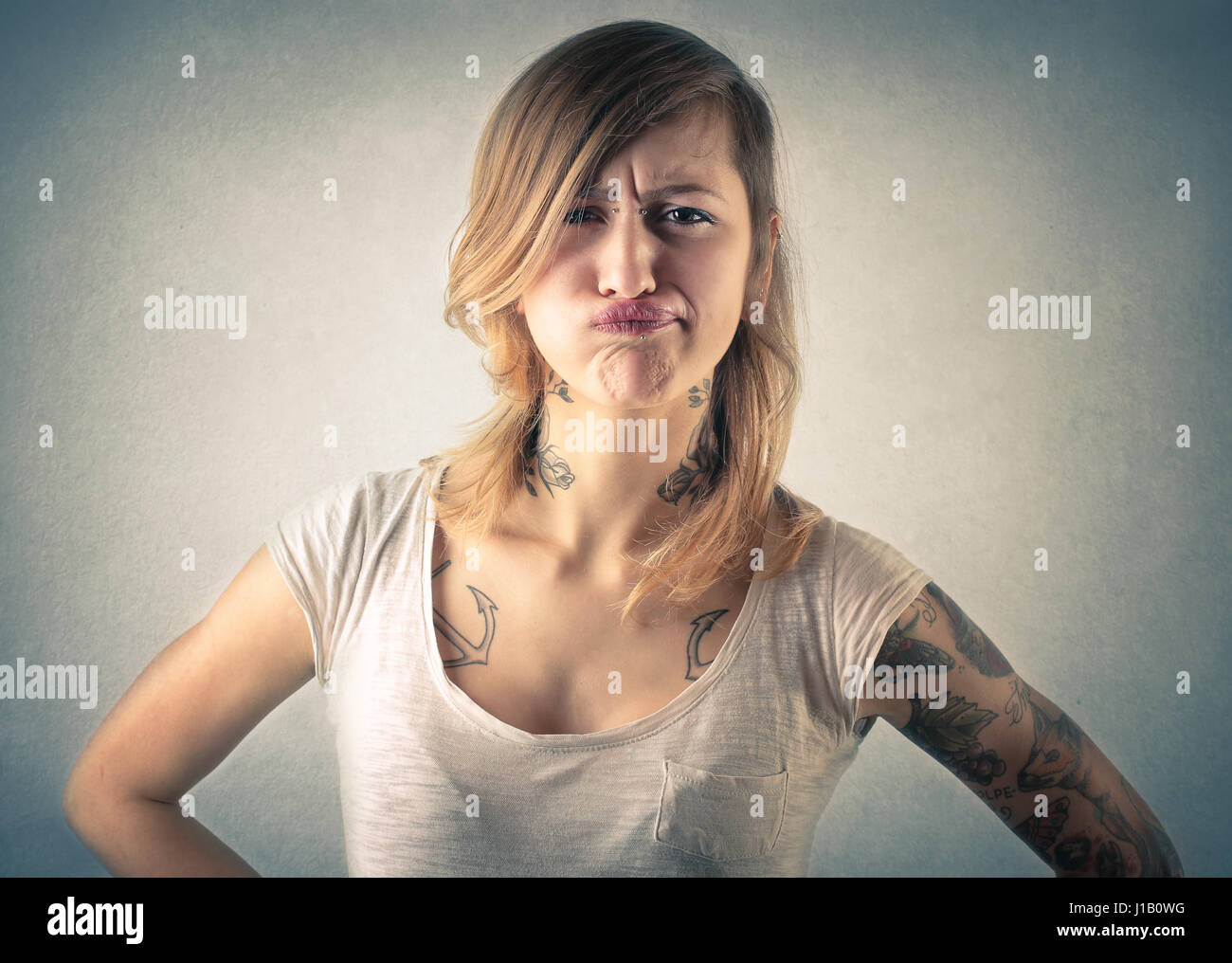 Portrait of doubtful woman Stock Photo - Alamy