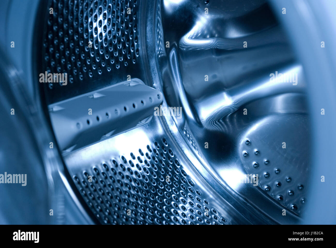 Inside of a washing machine Stock Photo - Alamy