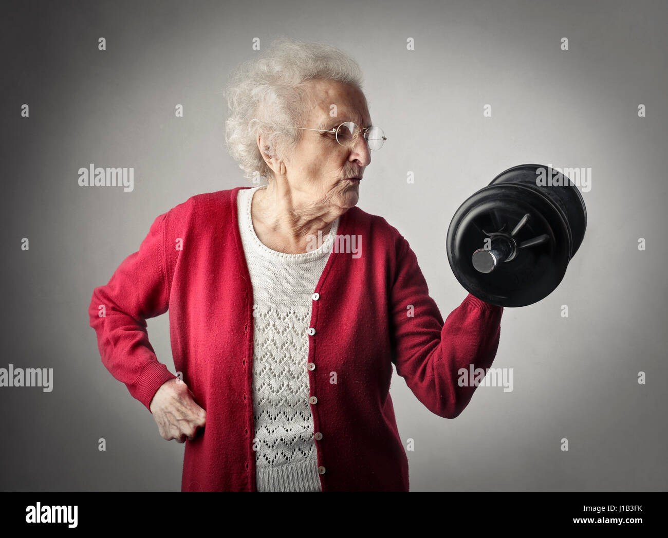 Old lady weightlifting Stock Photo - Alamy
