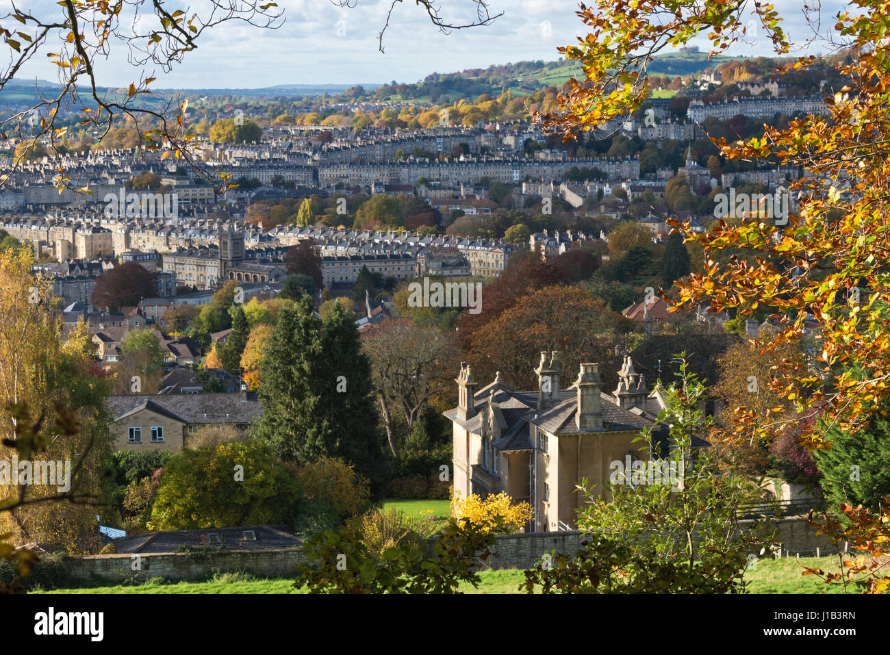 a colourful autumnal view across the city of Bath, Somerset, England ...
