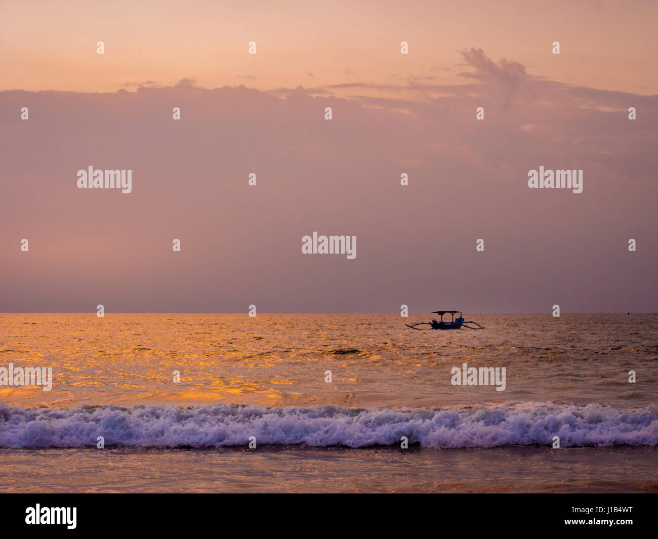 Sunset in Bali Beach, Indonesia Stock Photo - Alamy