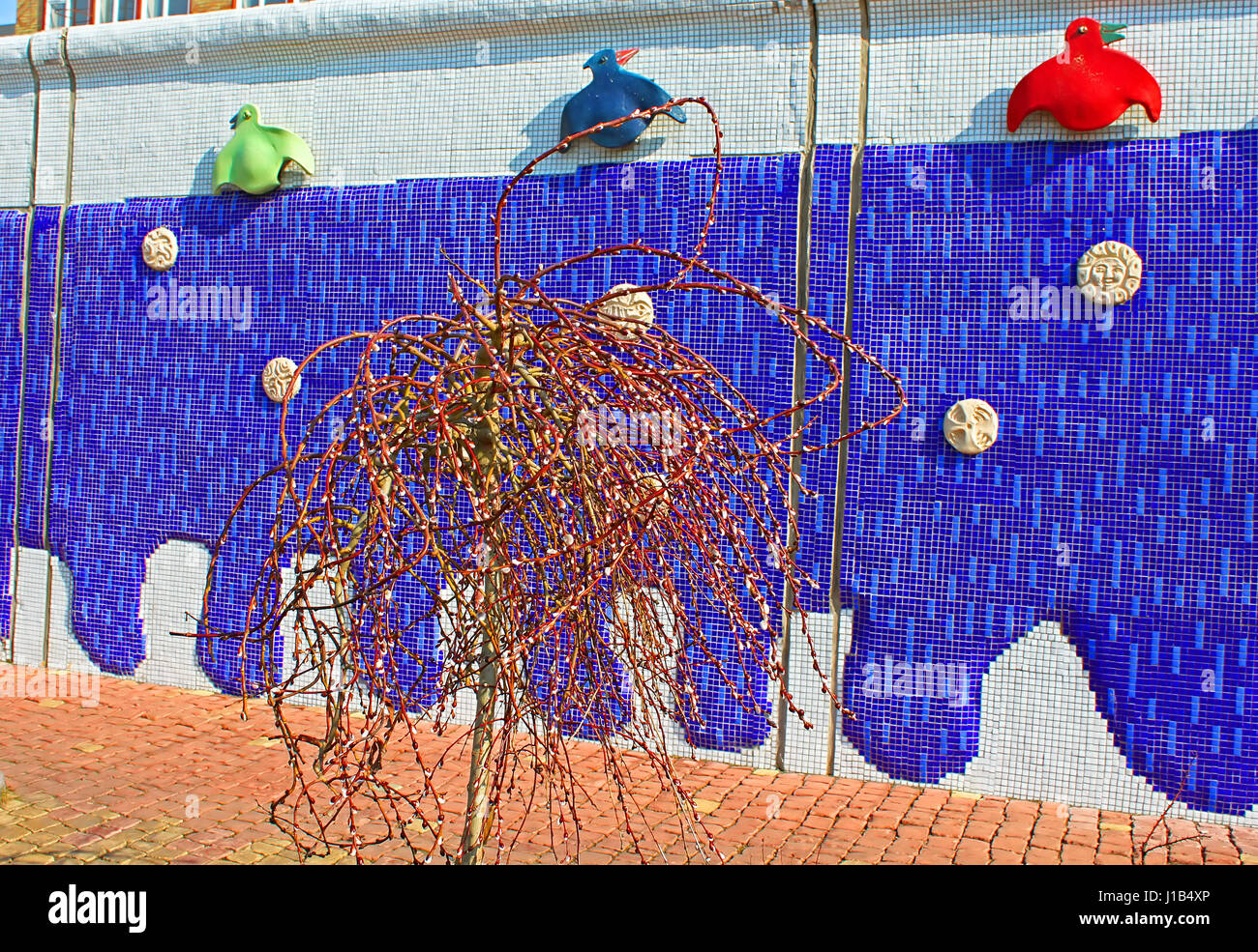 KYIV, UKRAINE - MARCH 18, 2012: Sculptured panel of colorful crows by ...