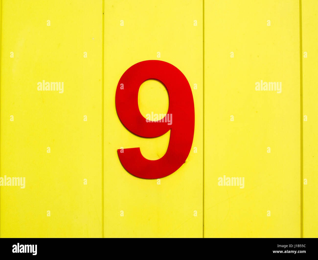Colourful numbered wooden Beach huts at Barry Island, South Wales ...