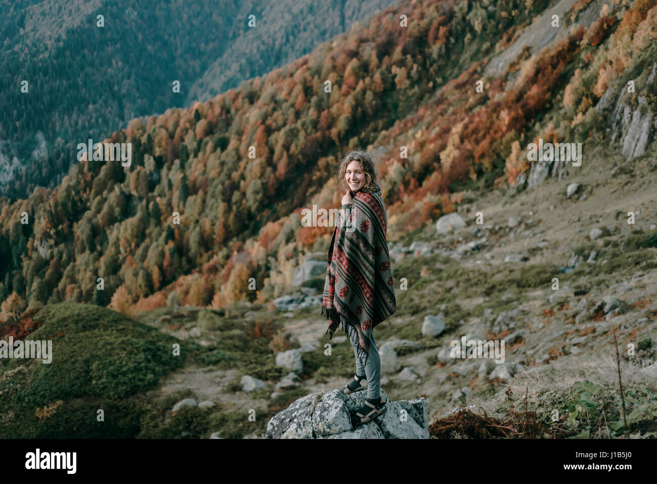 Woman on mountain valley hi-res stock photography and images - Alamy