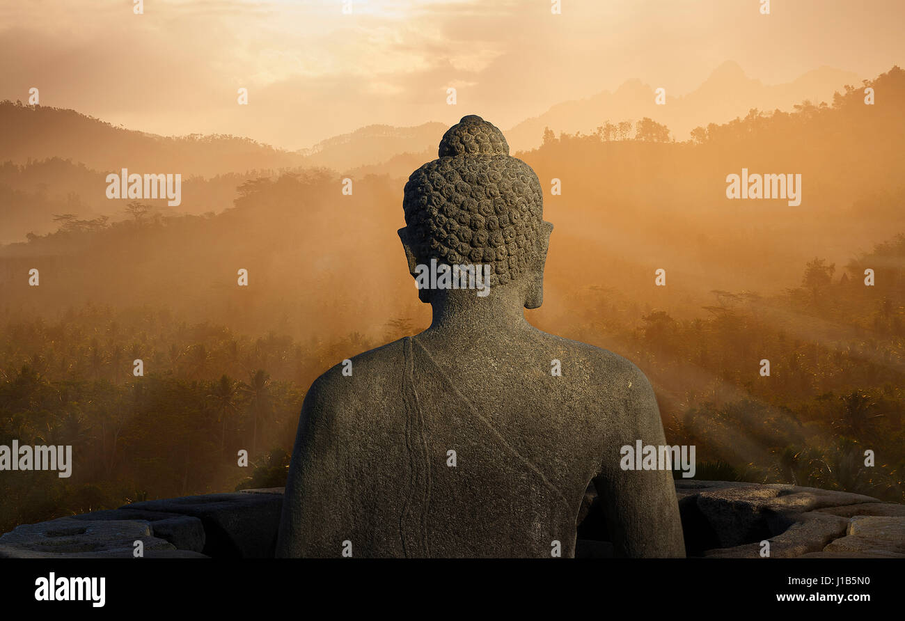 Statue of Buddha at sunset, Borobudur, Java, Indonesia Stock Photo - Alamy