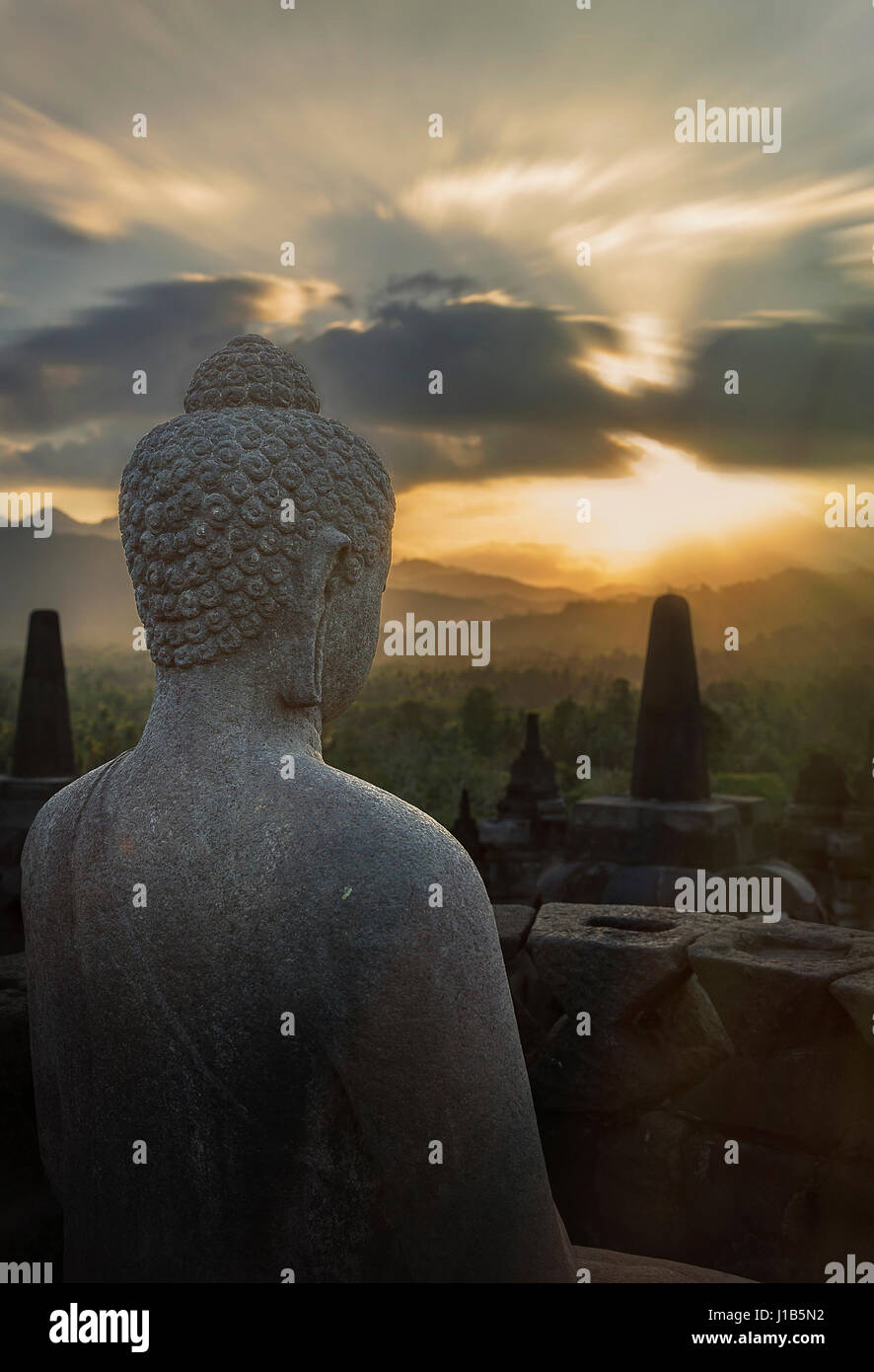Statue of Buddha at sunset, Borobudur, Java, Indonesia Stock Photo - Alamy