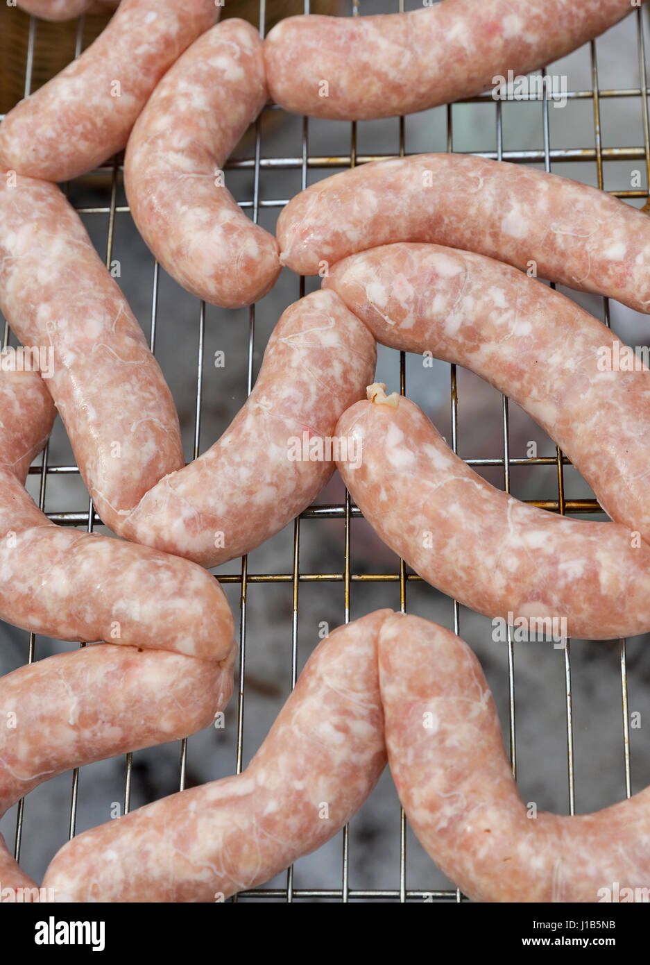 Raw sausage for grilling closeup prior to cooking Stock Photo - Alamy