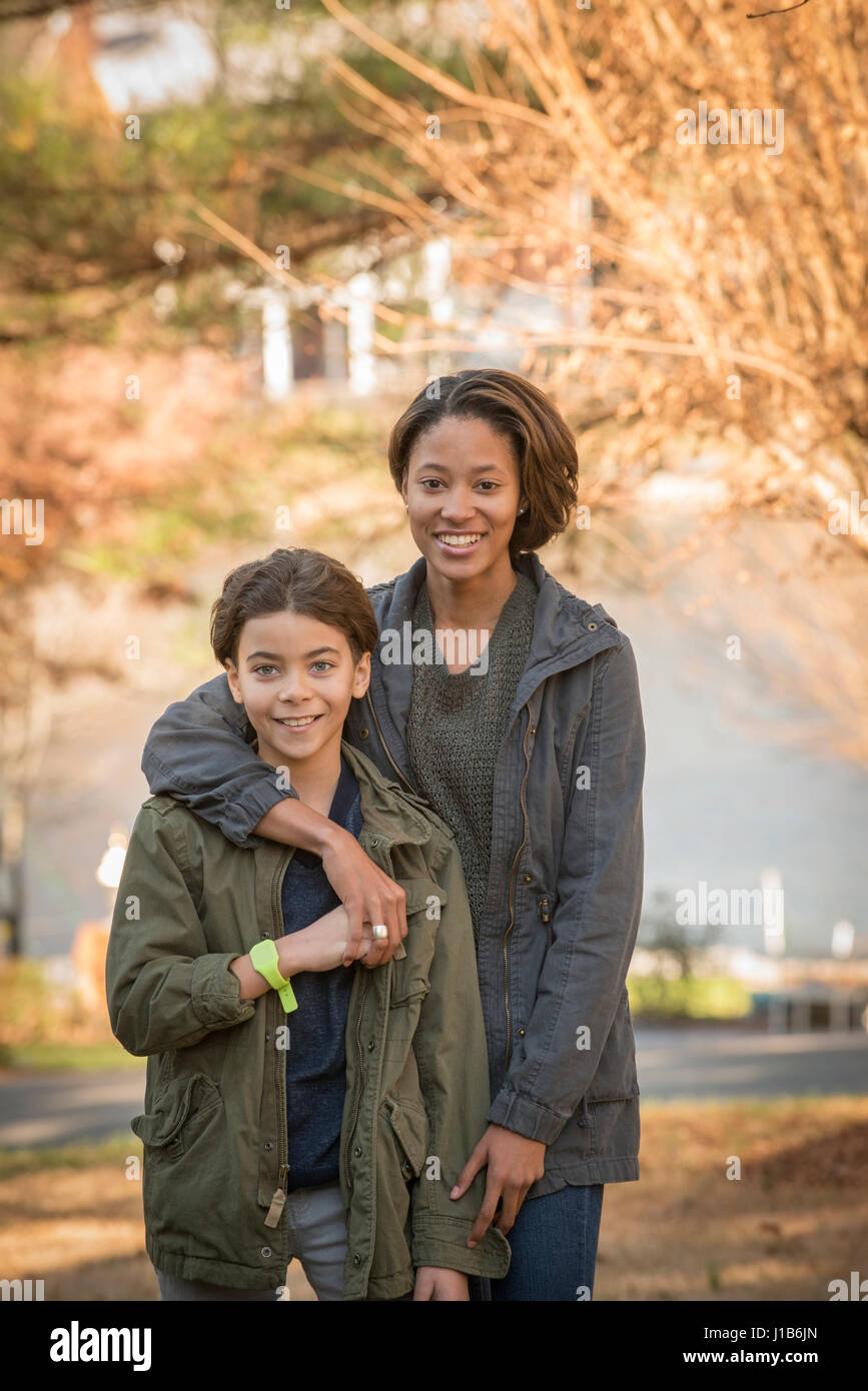 Portrait of smiling Mixed Race brother and sister outdoors Stock Photo ...