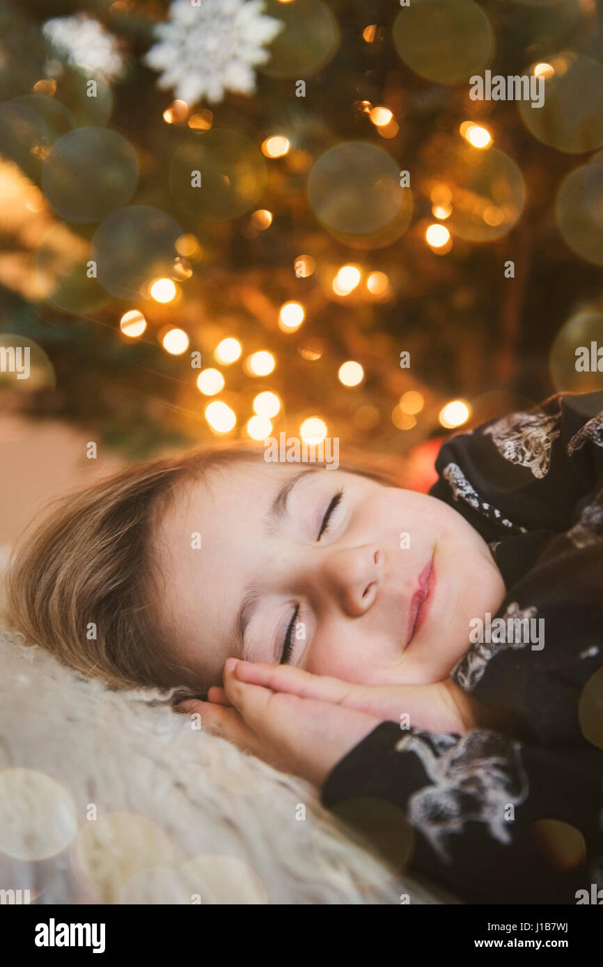Child girl under tree sleeping hi-res stock photography and images - Alamy